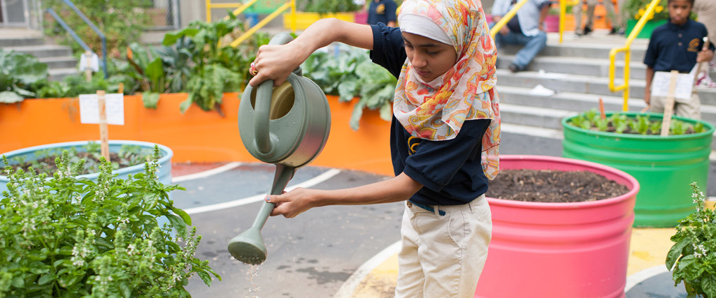 gardening_students_watering_lesson - Edible Schoolyard NYC